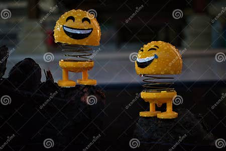 Two emoticons, smiling on stock photo. Image of figurine - 228347156