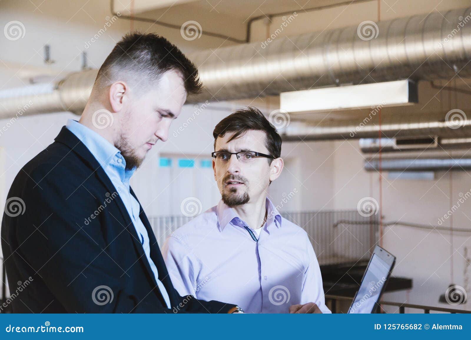 Two Employee Working Together at Coworking Open Office. Stock Photo ...
