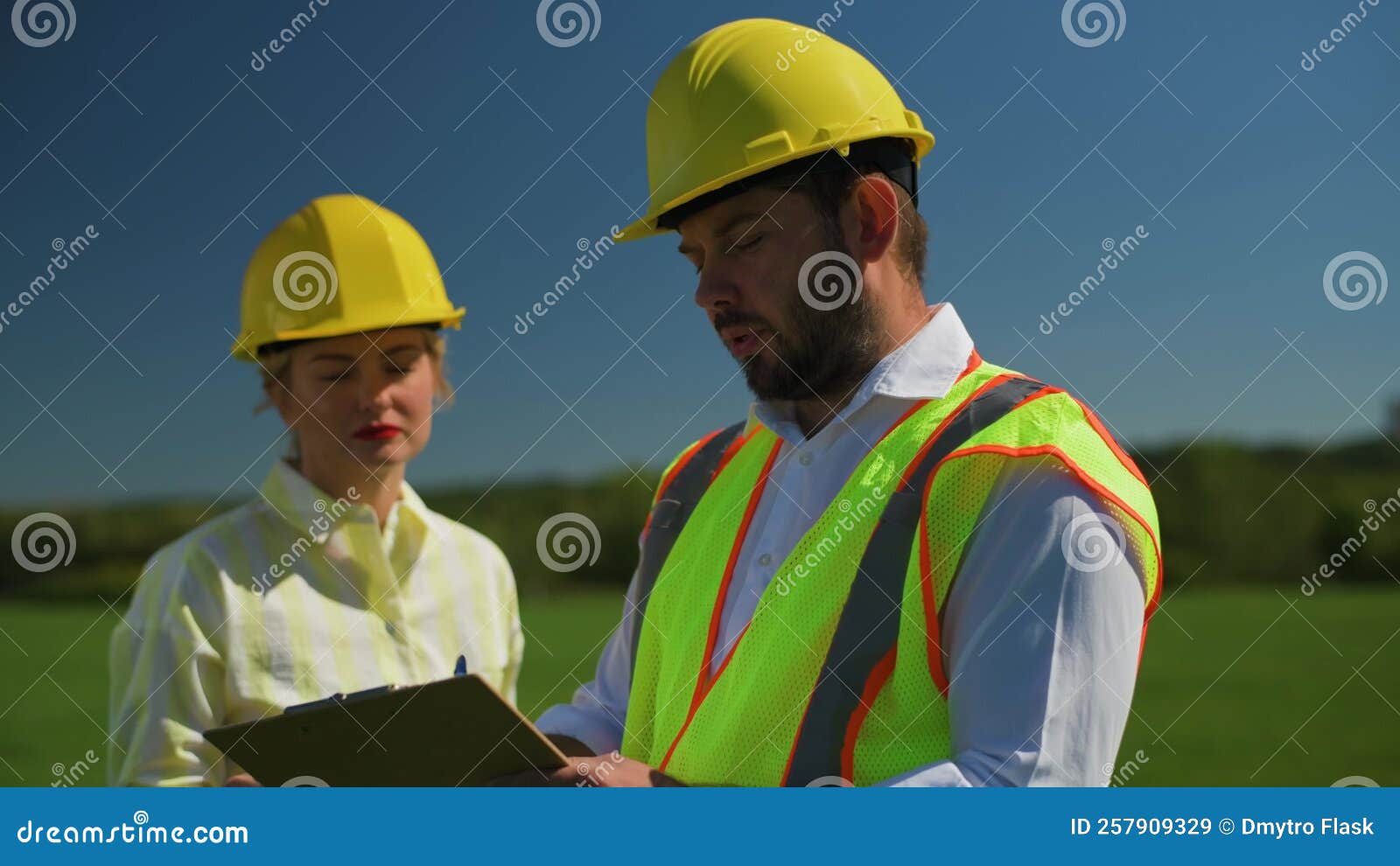 Two Employees of an Alternative Power Plant Talking about a Scheme of ...