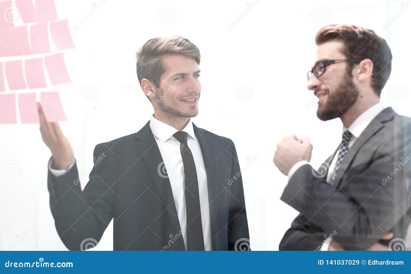 Two Employees Discuss the Business Objectives Stock Image - Image of ...