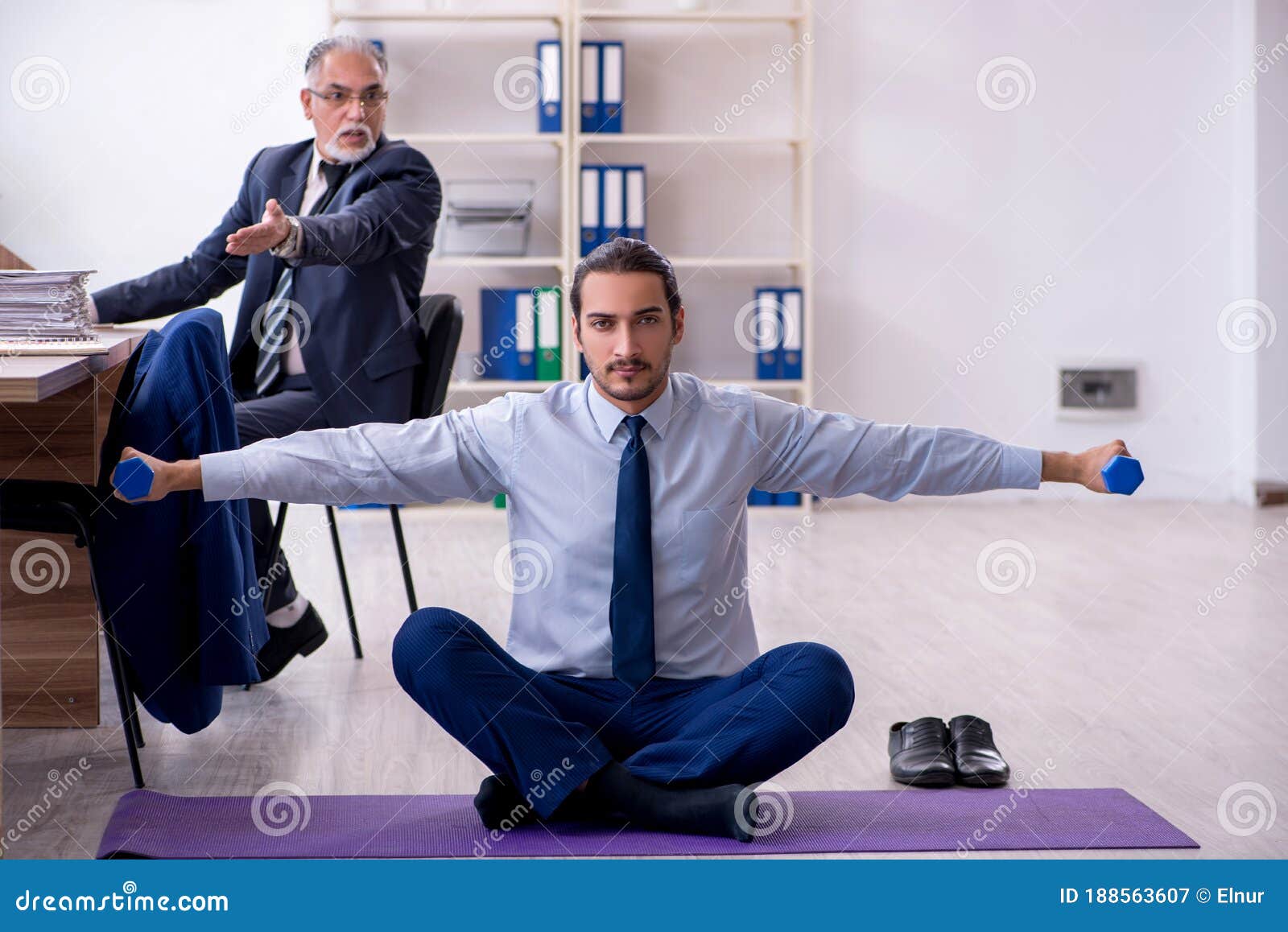 Two Employees Doing Physical Exercises at Workplace Stock Image - Image ...