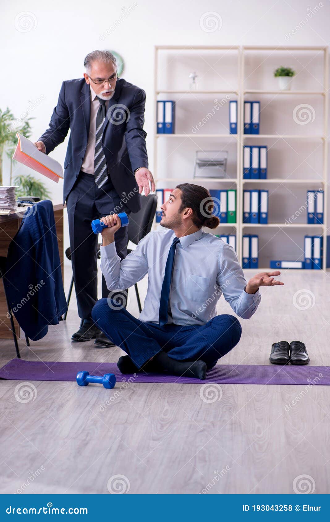 Two Employees Doing Physical Exercises at Workplace Stock Photo - Image ...