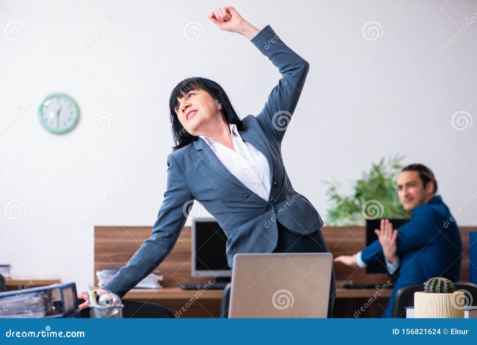 Two Employees Doing Sport Exercises in the Office Stock Photo - Image ...