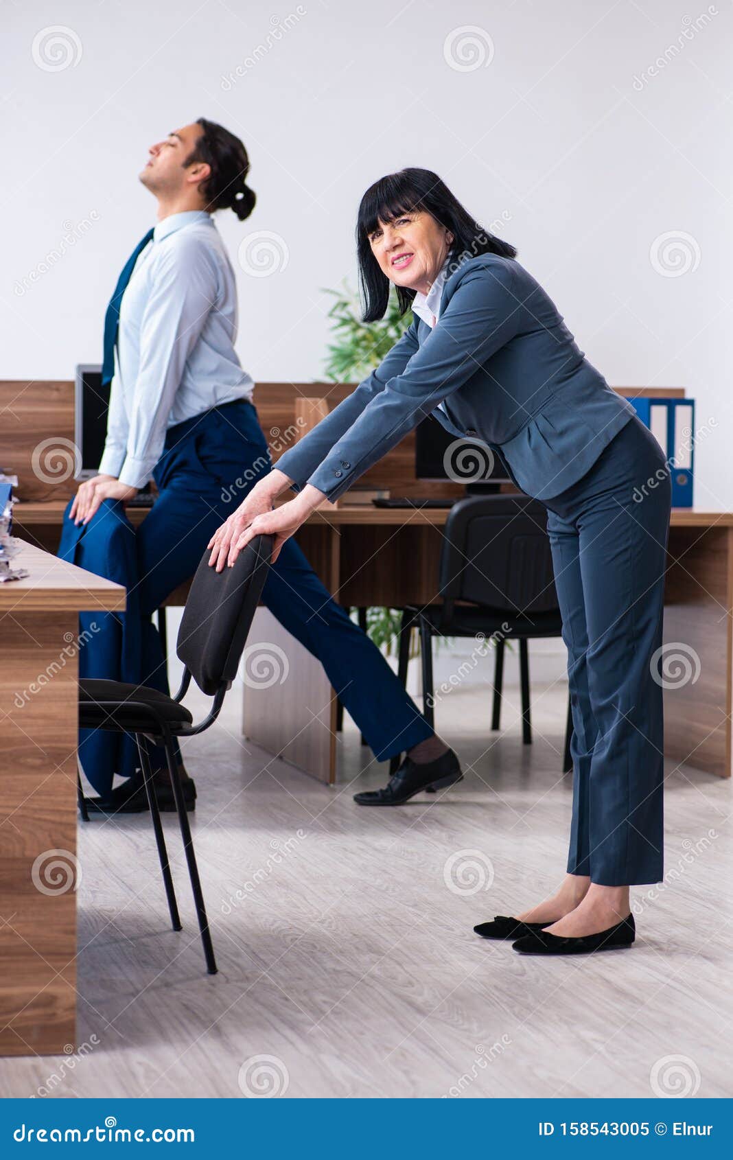 Two Employees Doing Sport Exercises in the Office Stock Image - Image ...