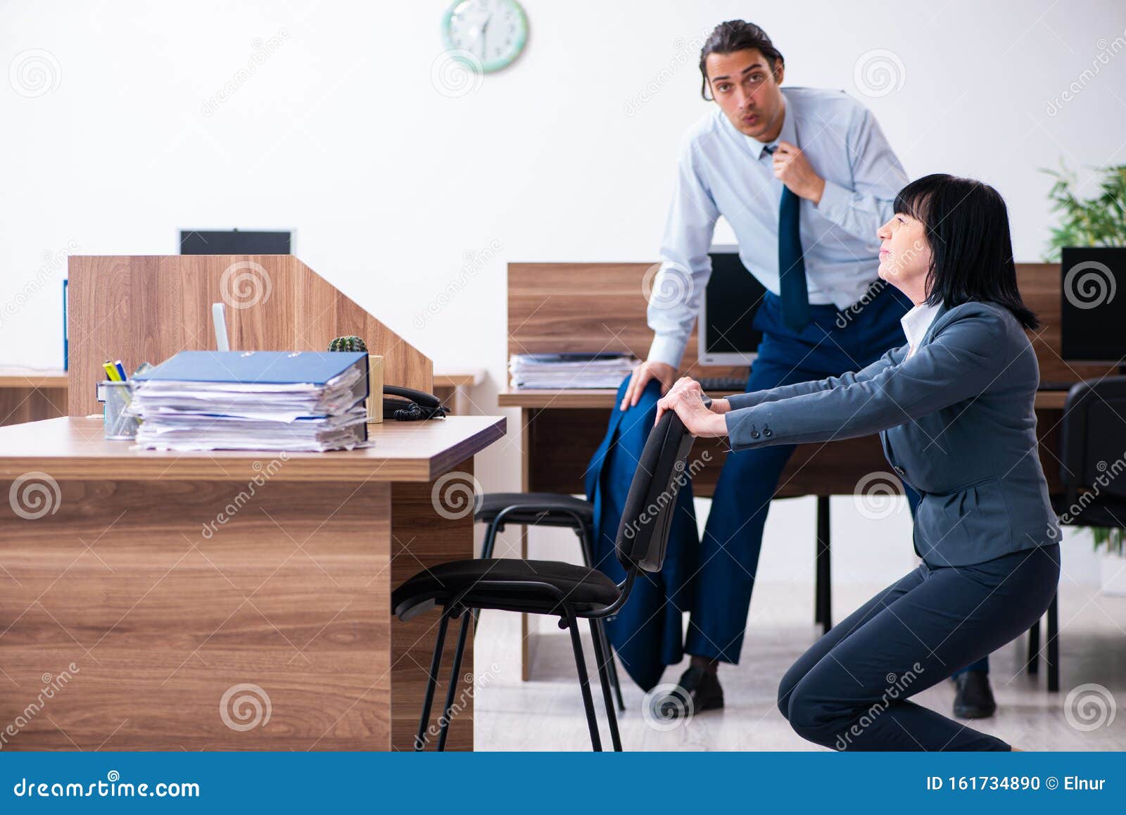 Two Employees Doing Sport Exercises in the Office Stock Photo - Image ...