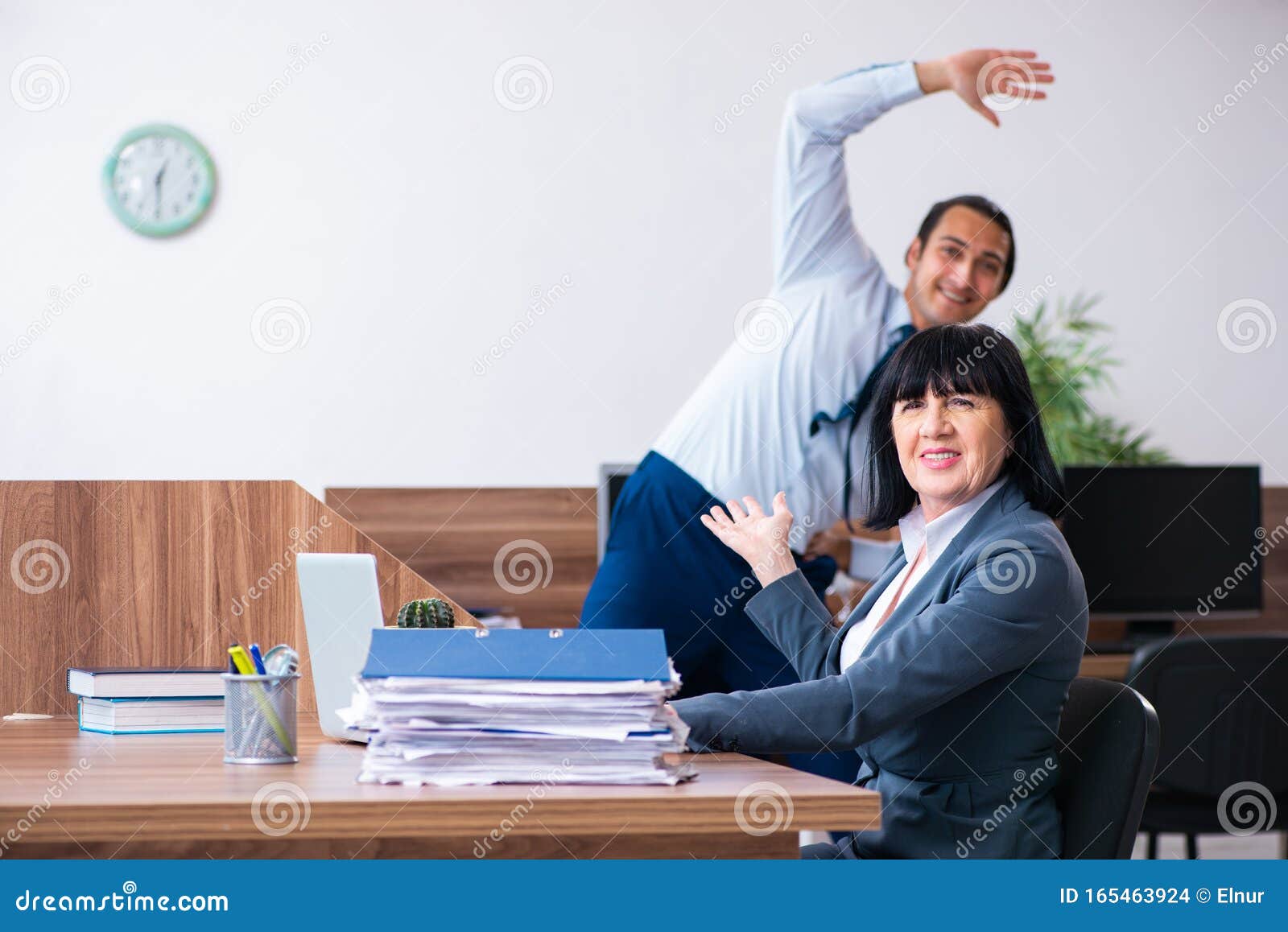 Two Employees Doing Sport Exercises in the Office Stock Photo - Image ...