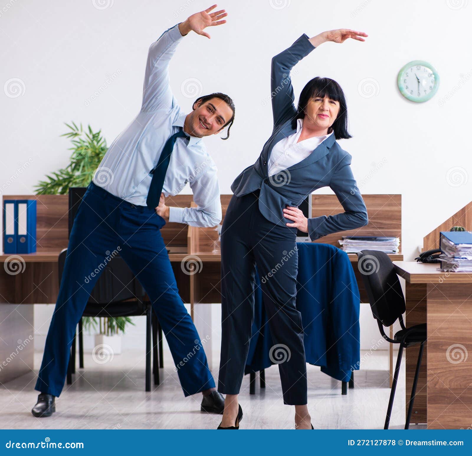 Two Employees Doing Sport Exercises in the Office Stock Photo - Image ...
