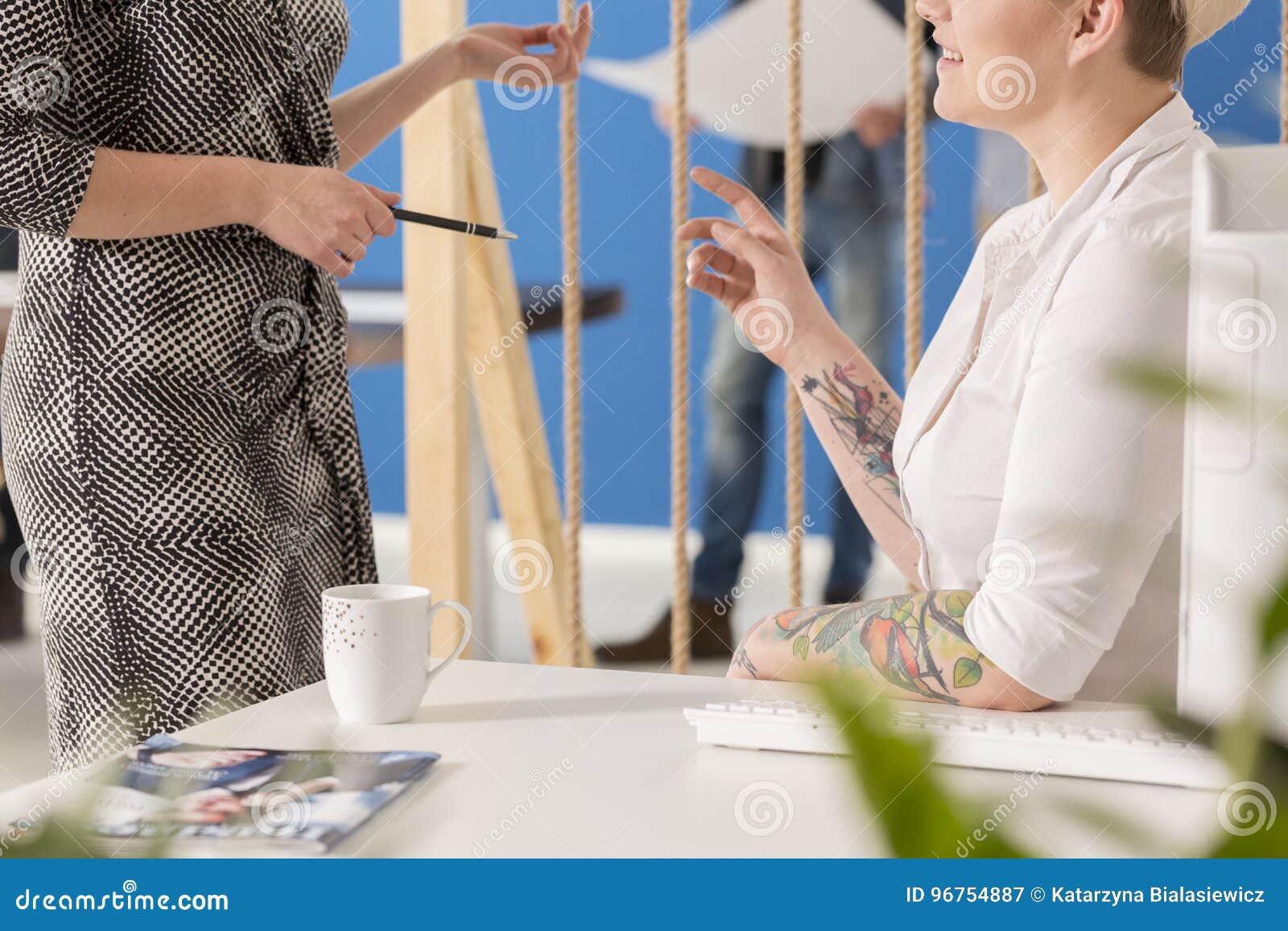 Two Employees Exchanging Ideas Stock Image - Image of cooperation ...