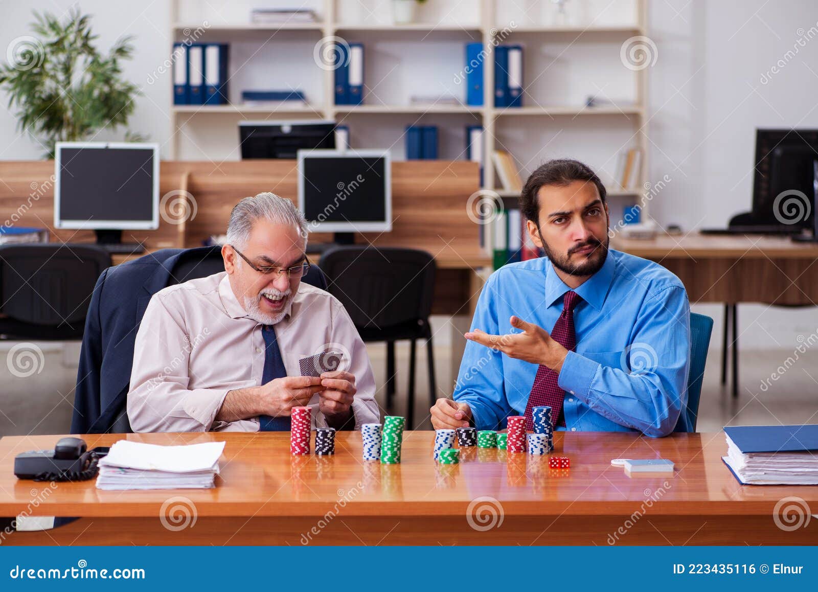 Two Male Employees Playing Cards at Workplace Stock Photo - Image of ...