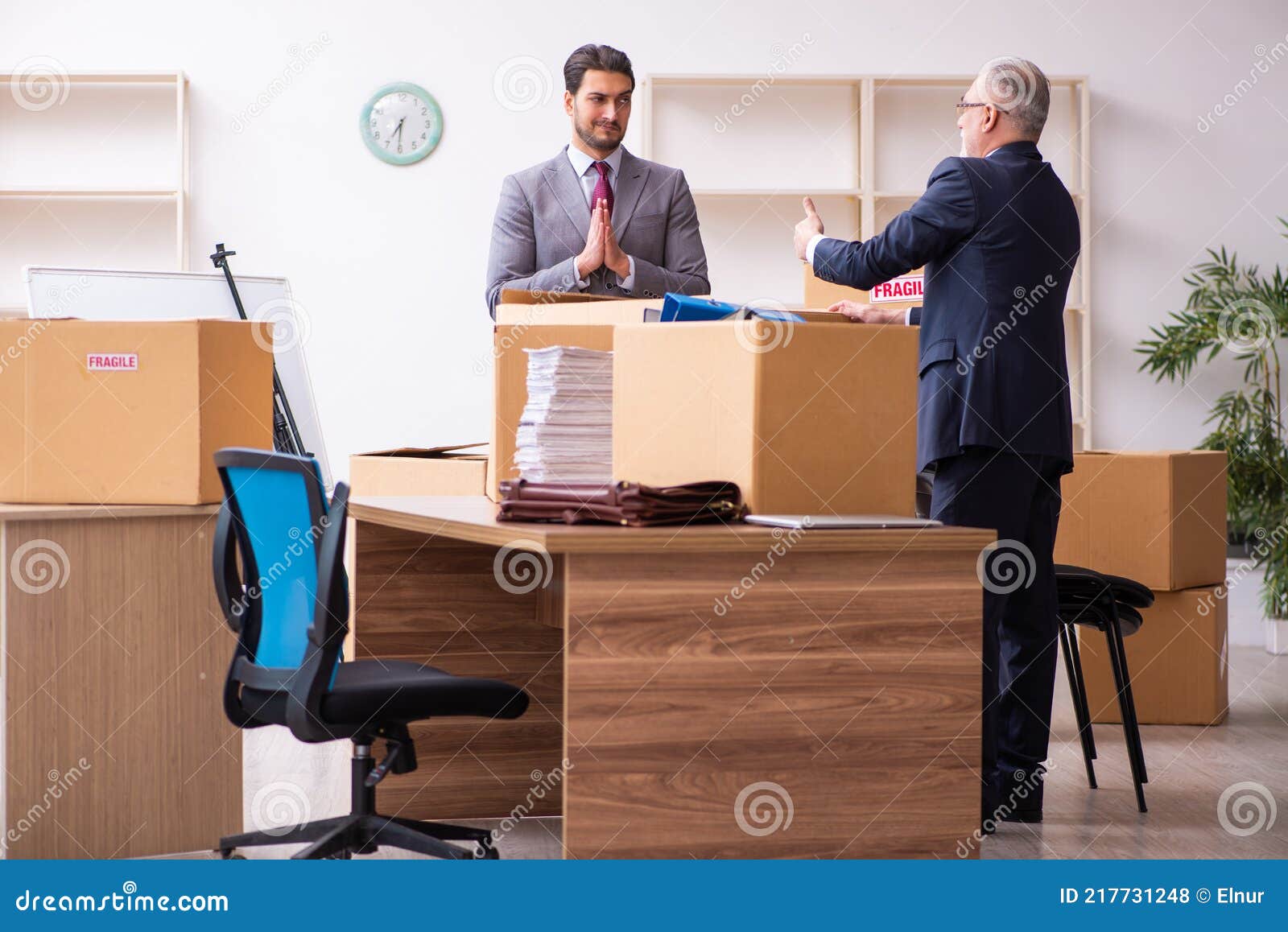 Two Male Employees in Relocation Concept Stock Photo - Image of manager ...