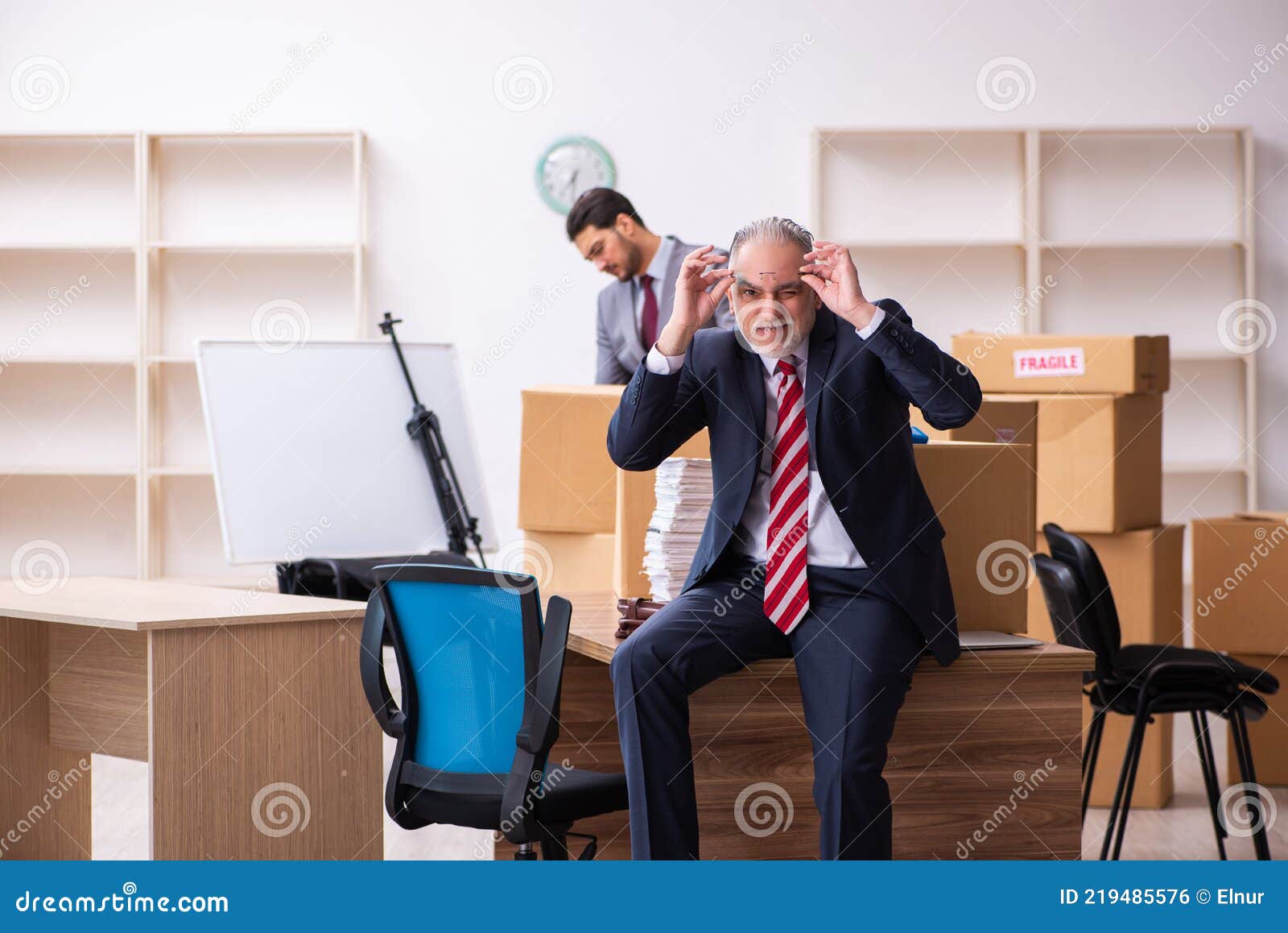 Two Male Employees in Relocation Concept Stock Photo - Image of ...