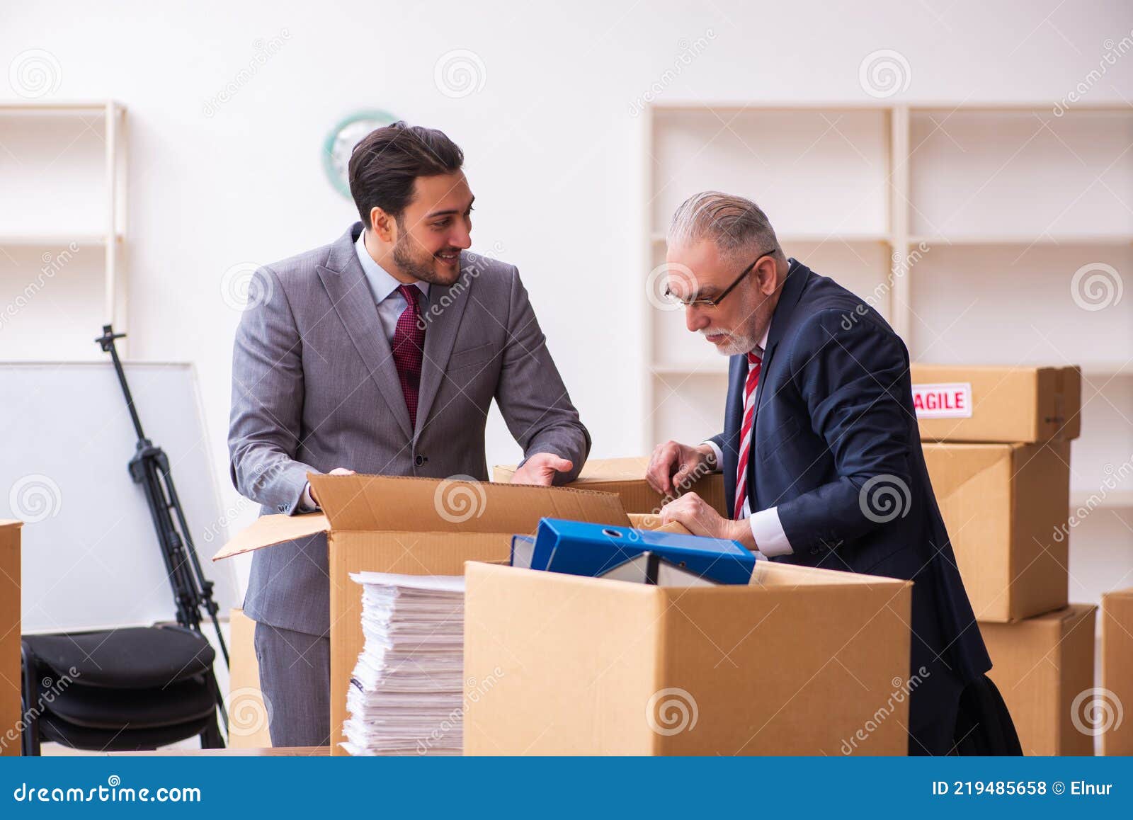 Two Male Employees in Relocation Concept Stock Photo - Image of ...