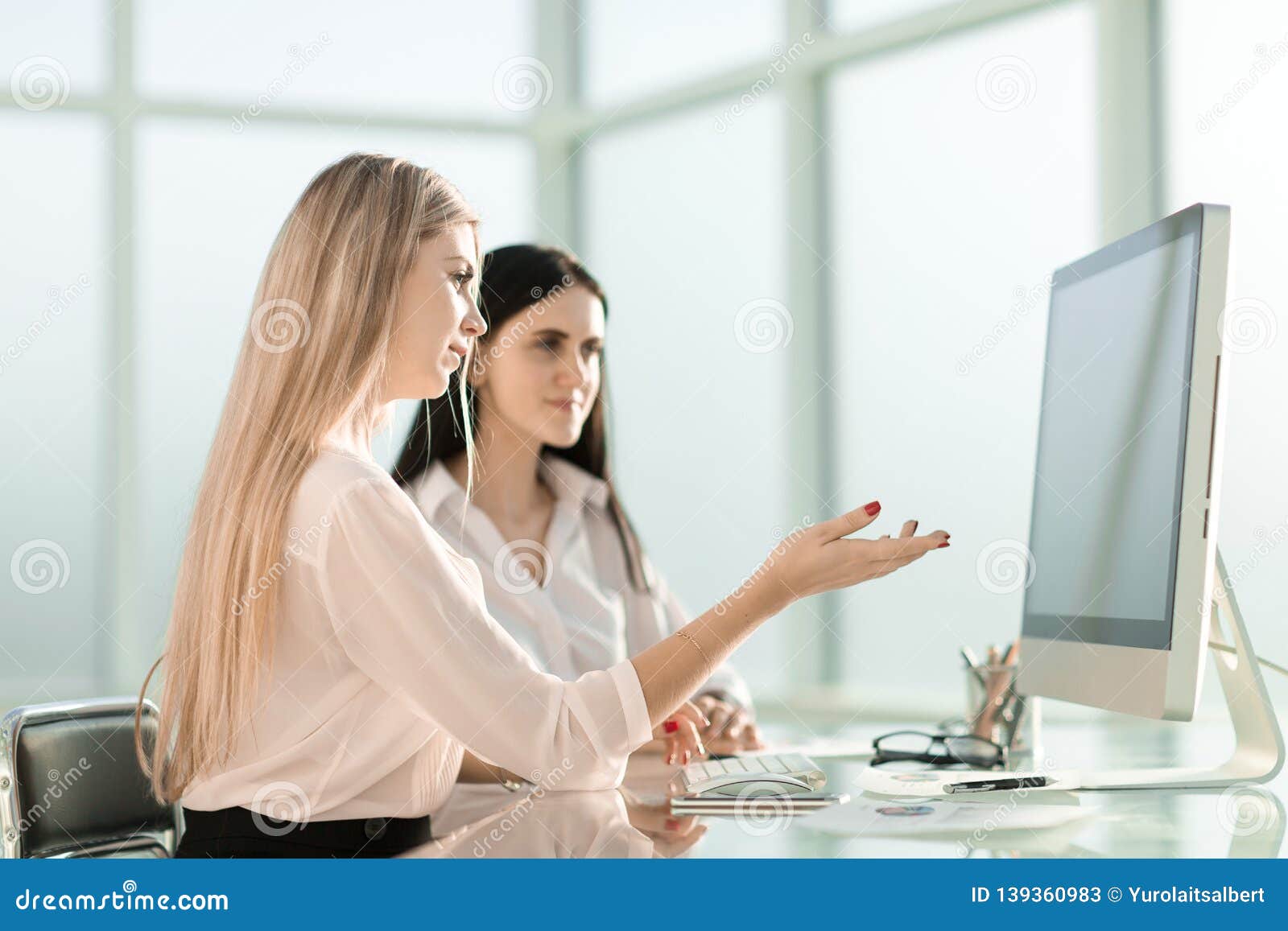 Two Employees Sitting at the Office Desk. Stock Image - Image of desk ...