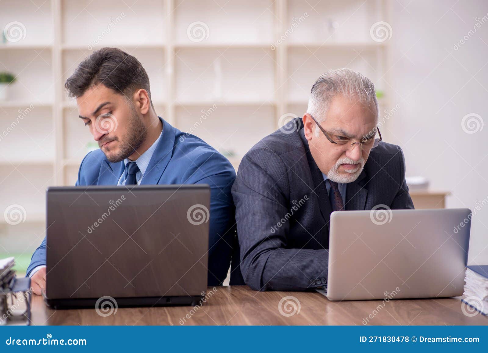 Two Male Employees Working in the Office Stock Photo - Image of ...