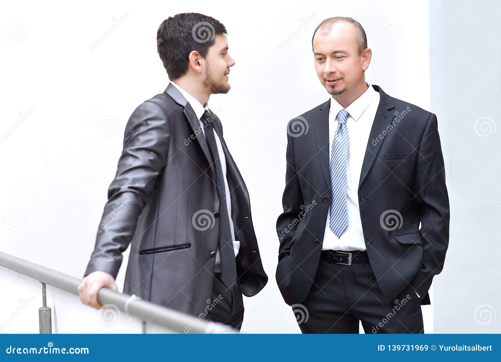 188 Two Colleagues Talking Hallway Stock Photos - Free & Royalty-Free ...