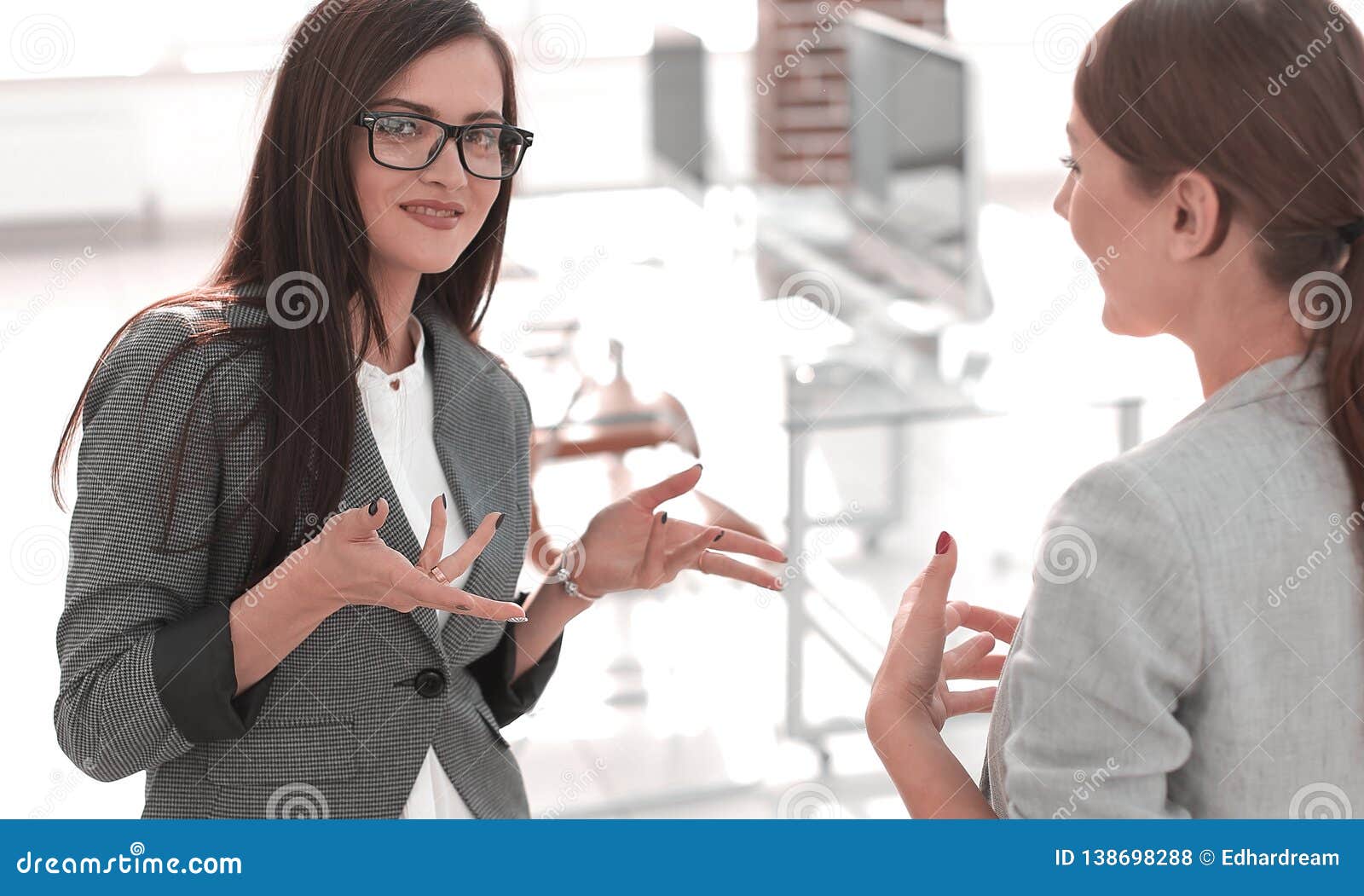 Two Employees Talking Standing in the Office Stock Photo - Image of ...