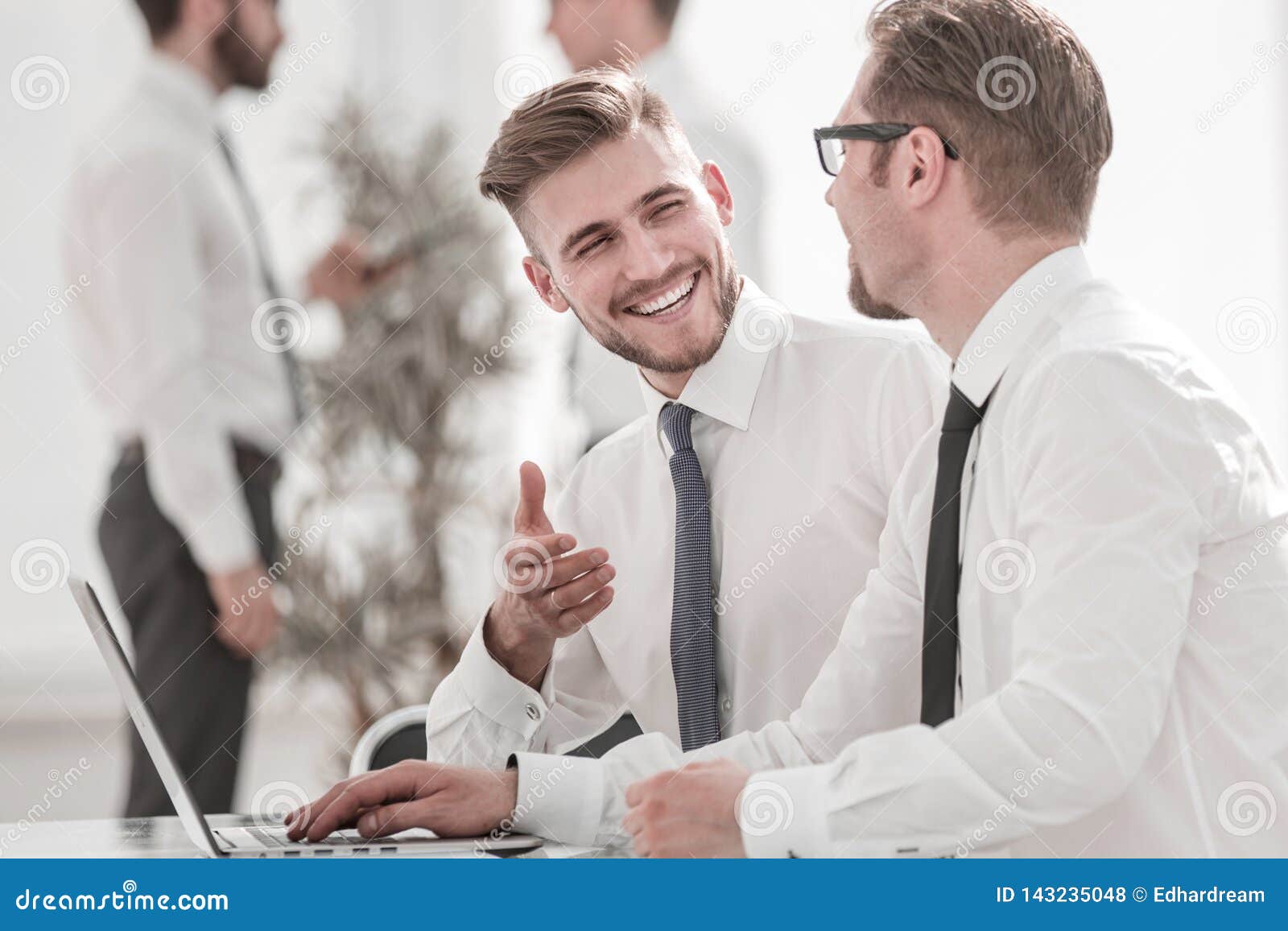 Two Employees Talking in the Workplace Stock Photo - Image of group ...