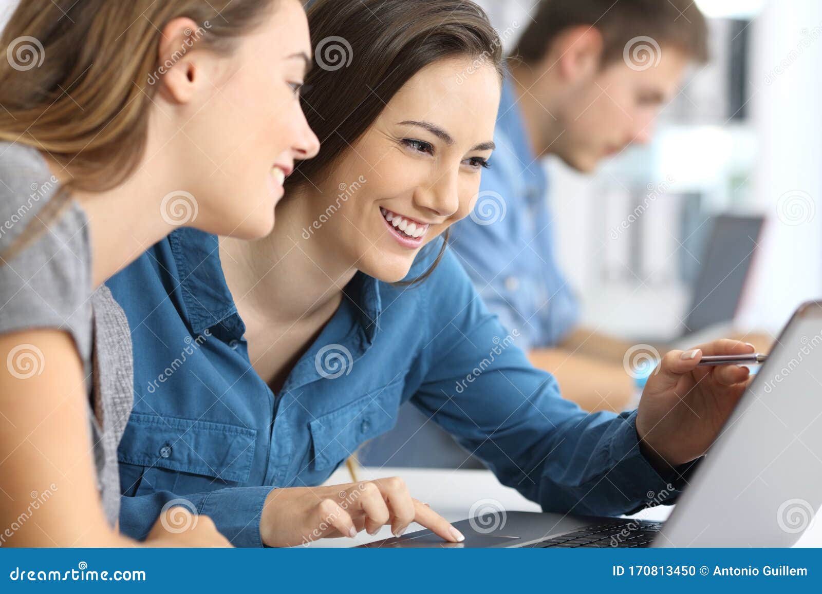 Two Employees Working on Line Together Stock Photo - Image of girls ...