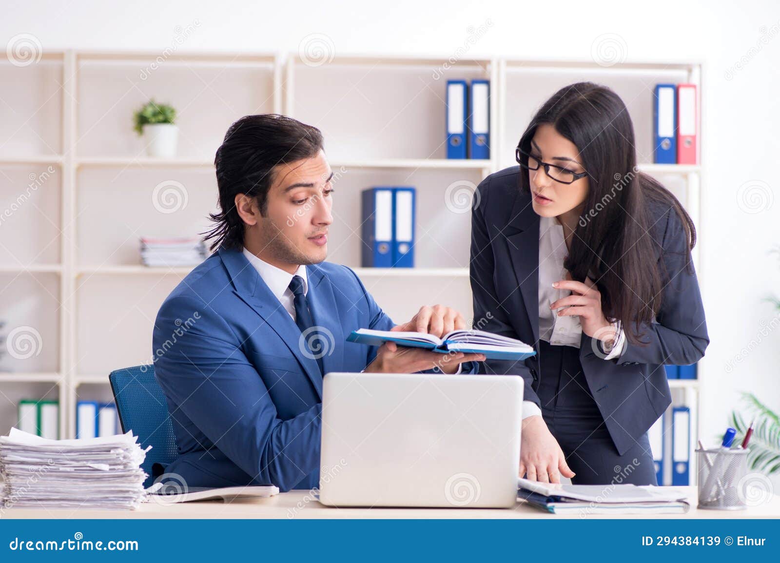 Two Employees Working in the Office Stock Image - Image of document ...