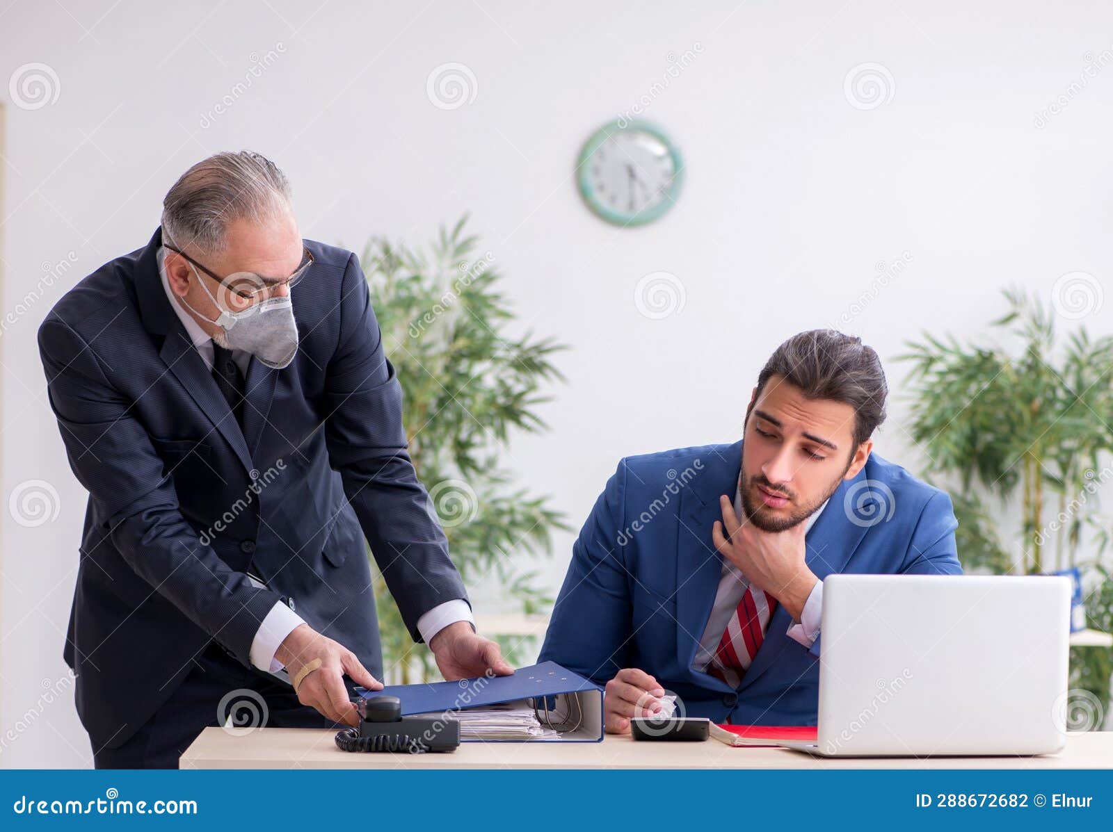 Two Employees at Workplace during Pandemic Stock Photo - Image of ...