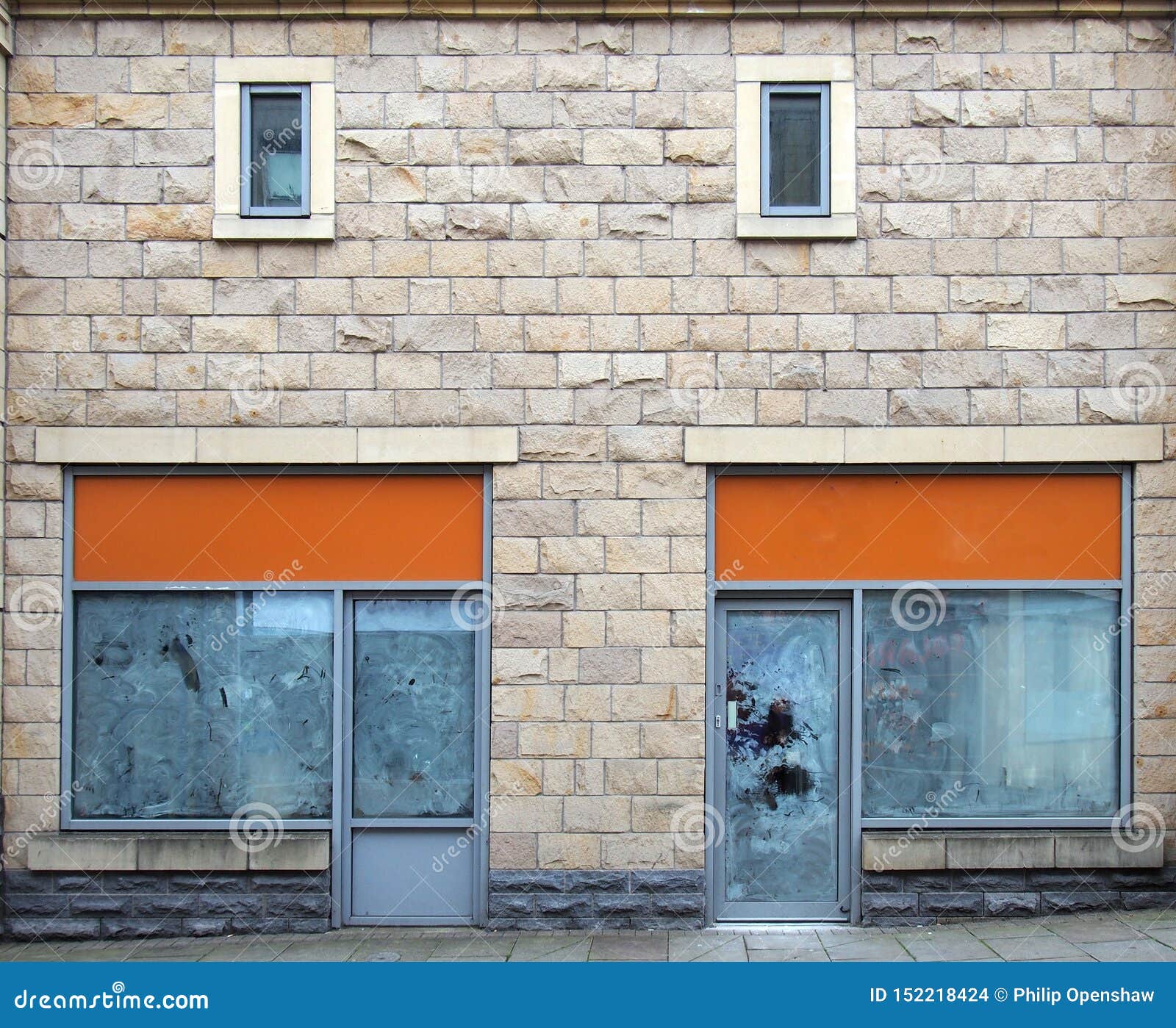 Empty Abandoned Shops on a Street with Whitewashed Empty Windows and ...