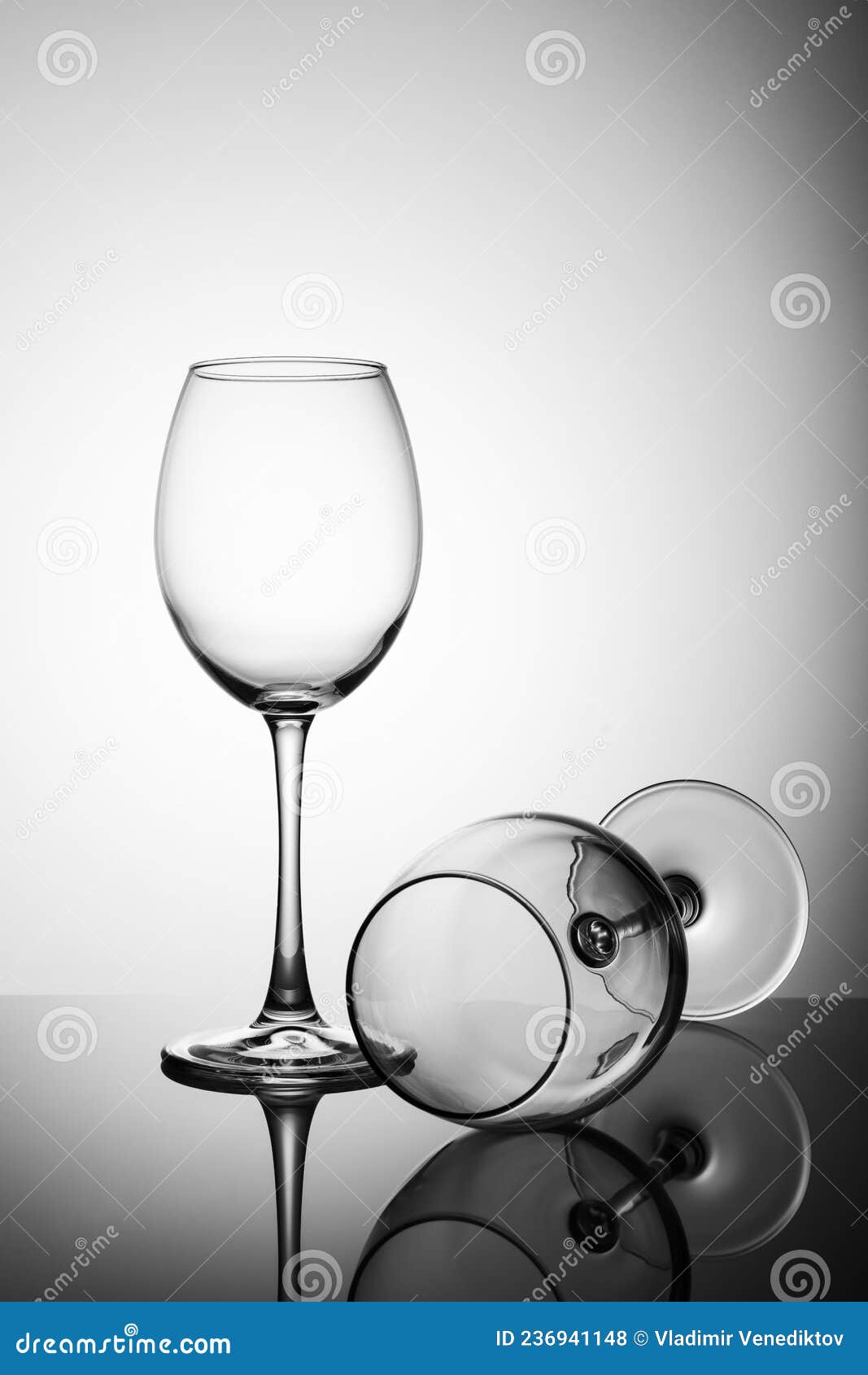 Two Empty Glasses on a Black Table with a Reflection Stock Photo ...