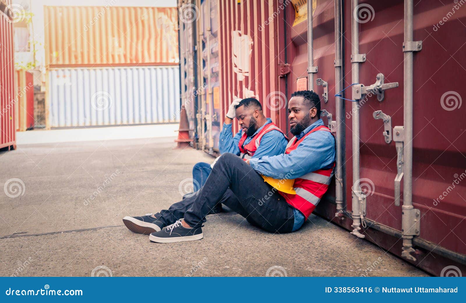 Two Engineer or Foreman Wears PPE Sitting Stress on Container ...