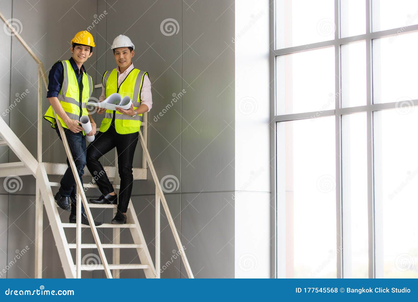 Two engineer reading plan stock photo. Image of plan - 177545568