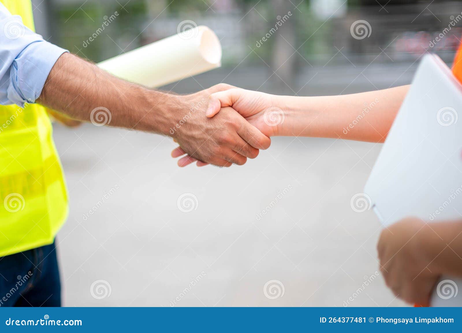 Two Engineer Shaking Hands with Deals and Success Agreement at ...