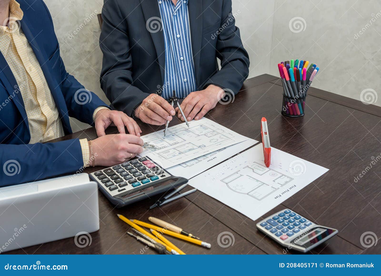 Two Engineer Working Together with Architecture House Blueprint at ...