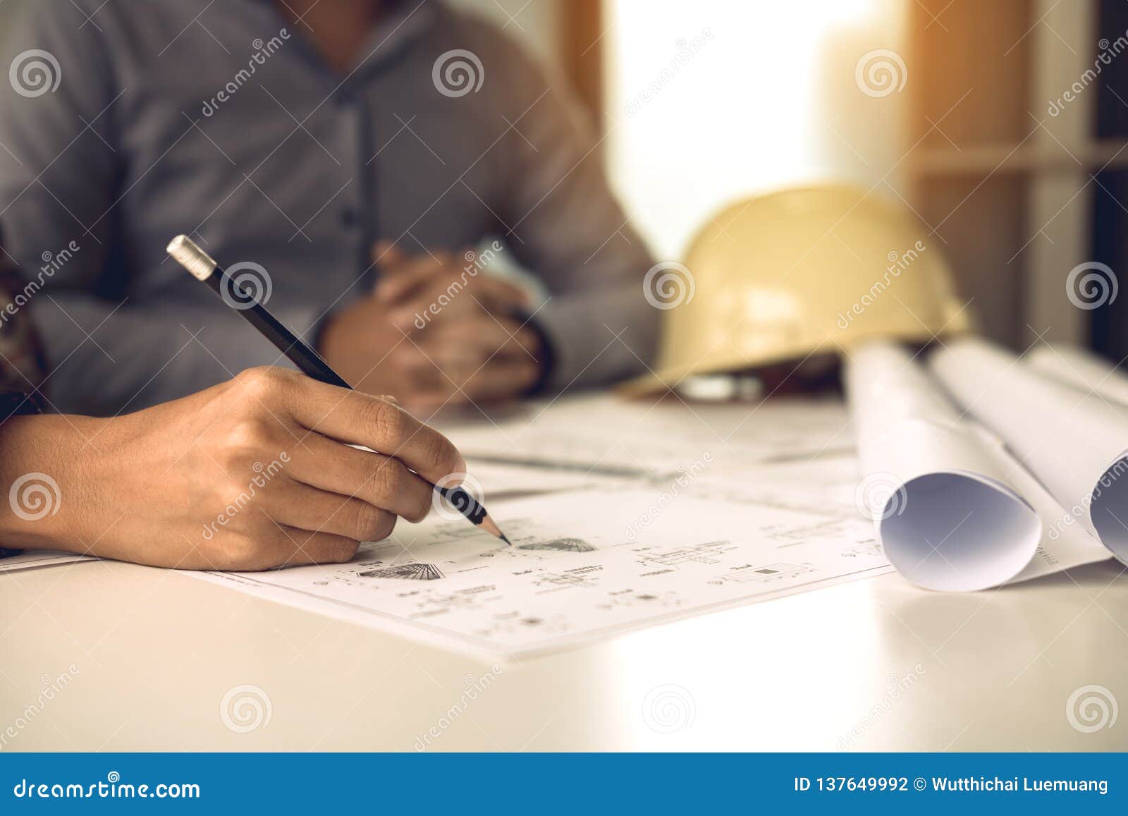 Two Engineering Man or Co-workers Working on a Project and Discussing ...