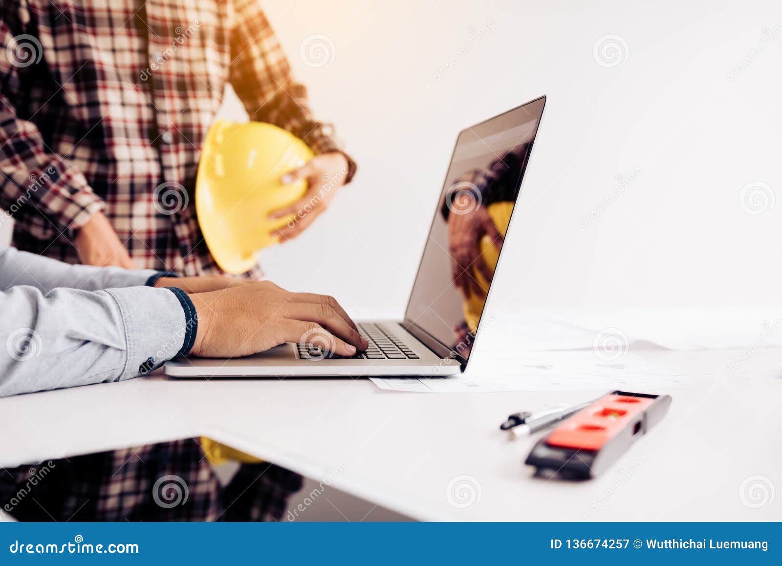 Two Engineering Man Working with Laptop and Discussing Project Together ...