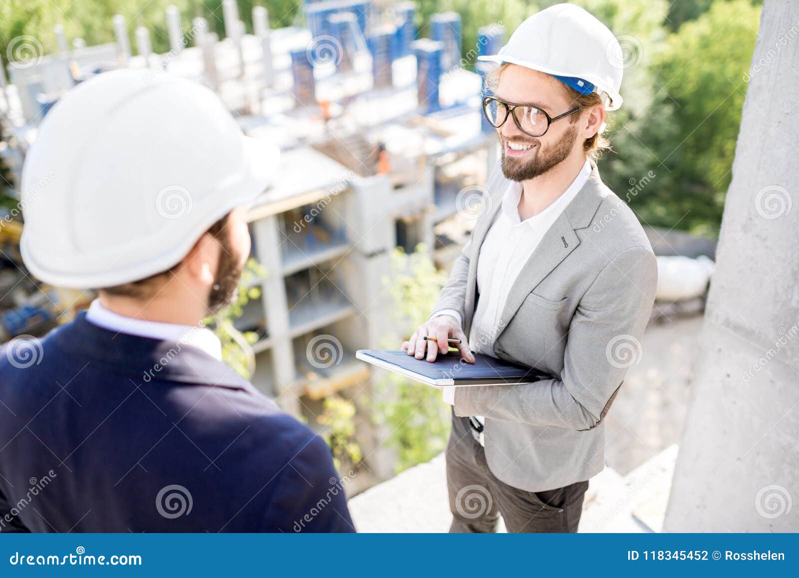 Supervising the Process of House Construction Stock Photo - Image of ...