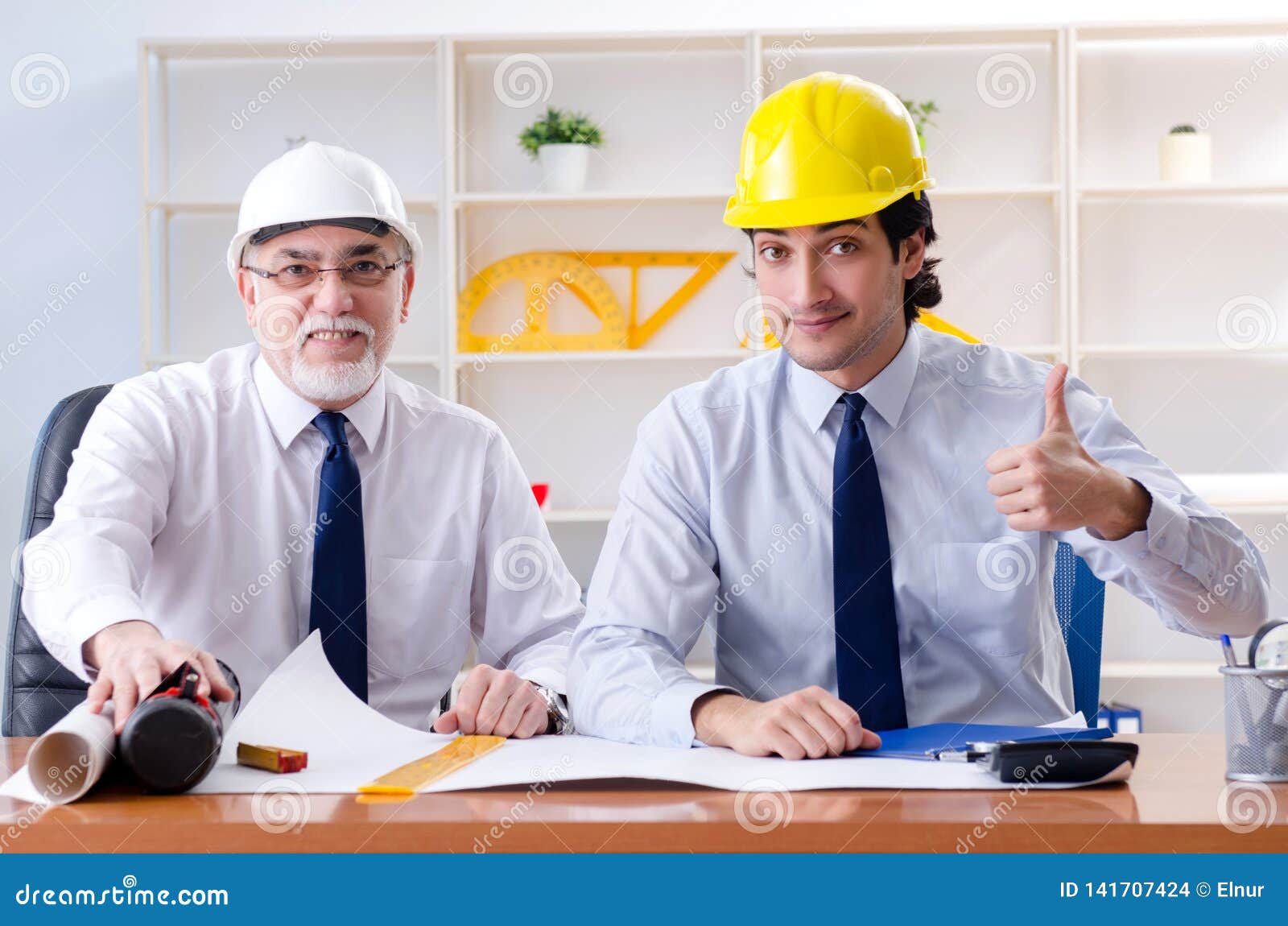 The Two Engineers Colleagues Working Under Project Stock Photo - Image ...