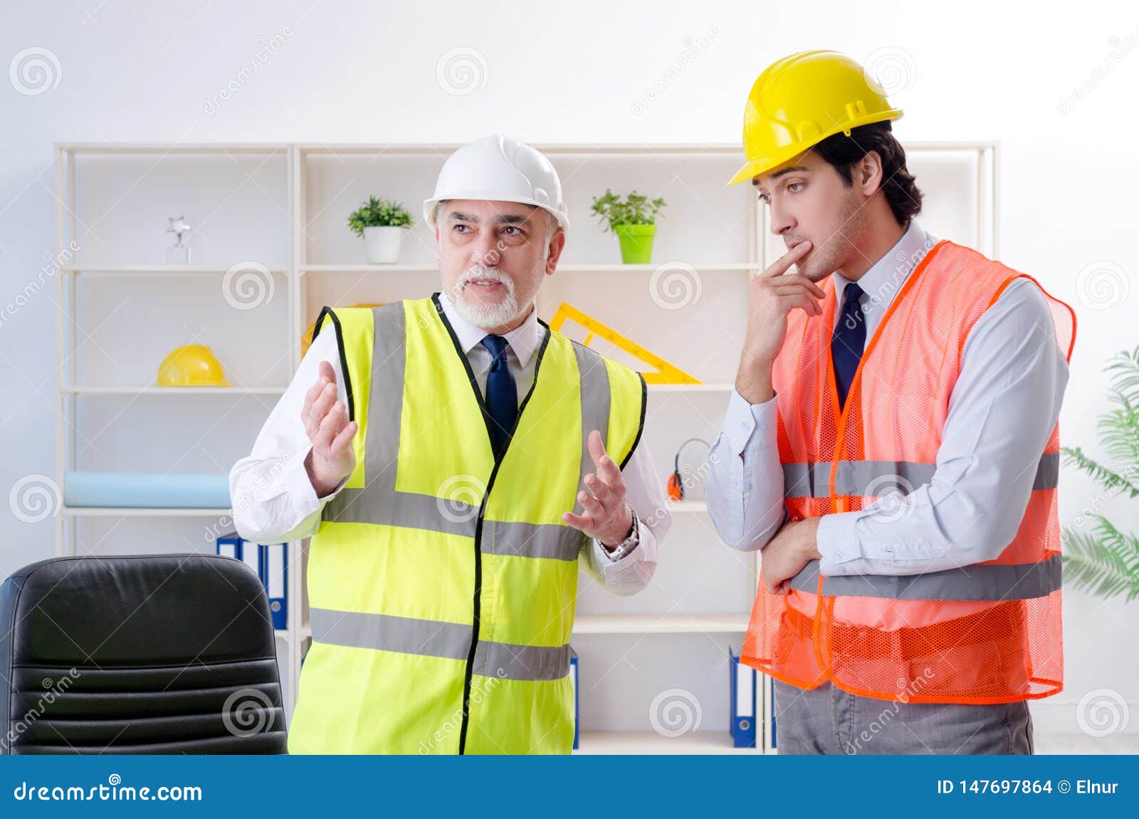 The Two Engineers Colleagues Working Under Project Stock Photo - Image ...