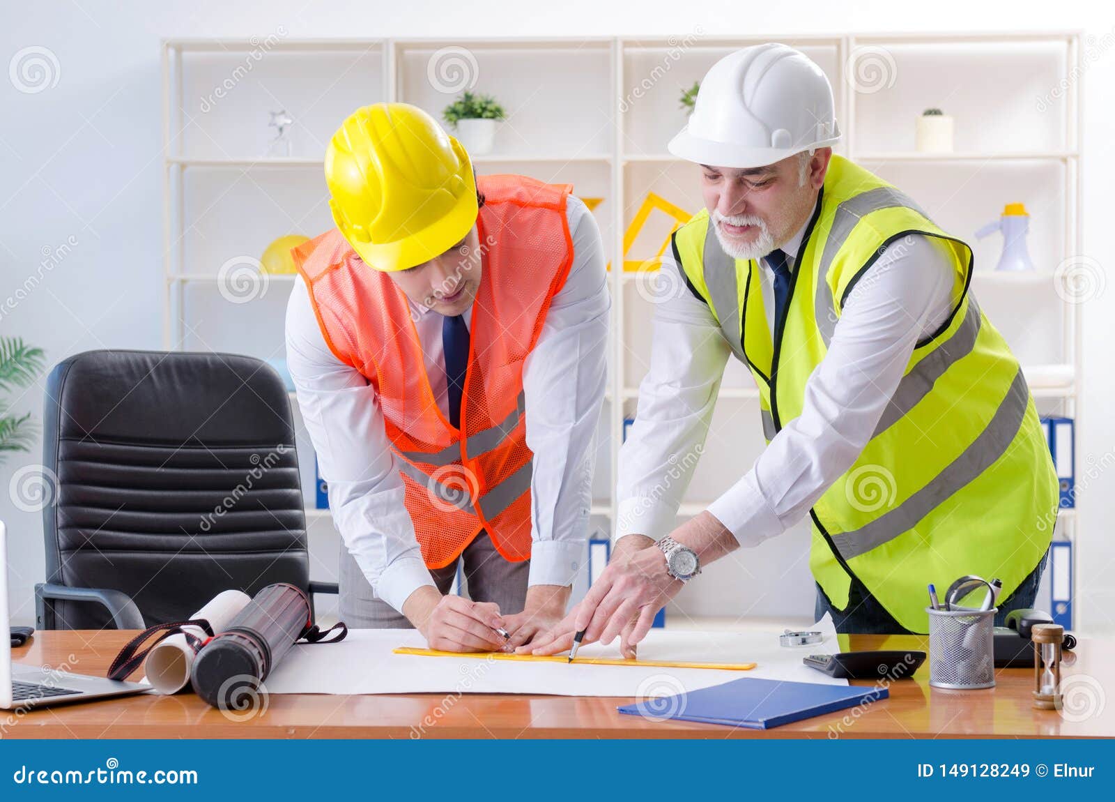 The Two Engineers Colleagues Working Under Project Stock Image - Image ...