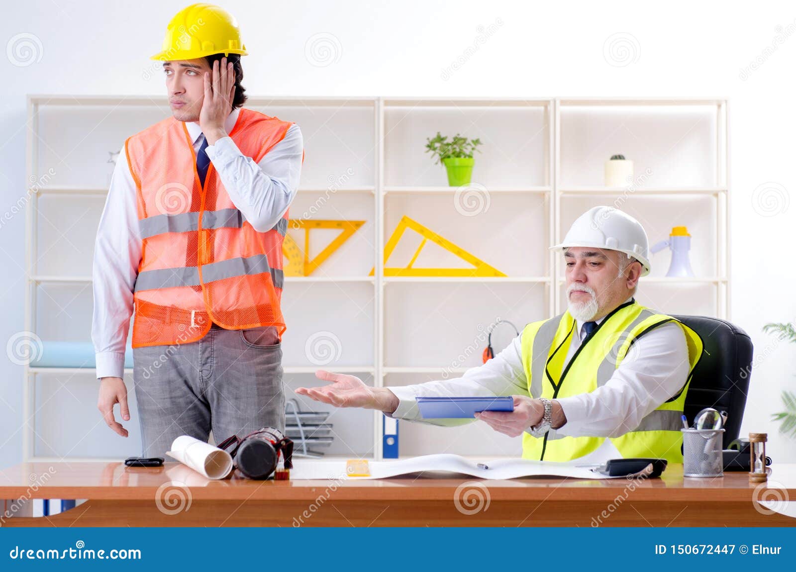 The Two Engineers Colleagues Working Under Project Stock Image - Image ...