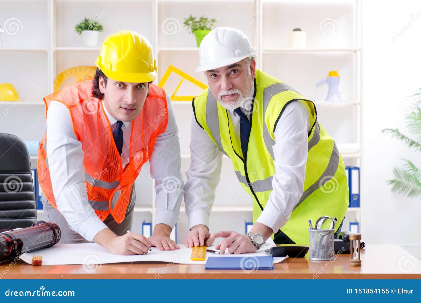 Two Engineers Colleagues Working Under Project Stock Image - Image of ...