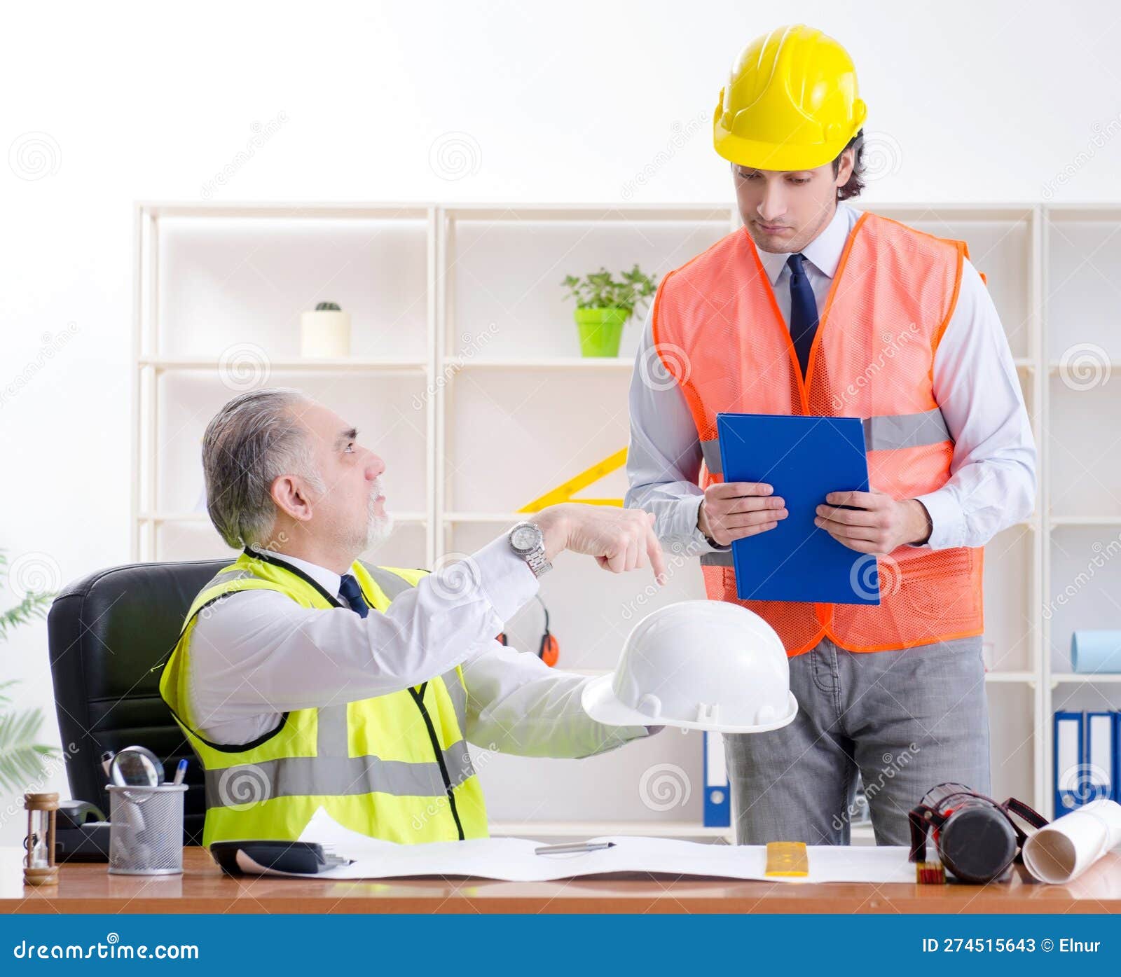 Two Engineers Colleagues Working Under Project Stock Image - Image of ...