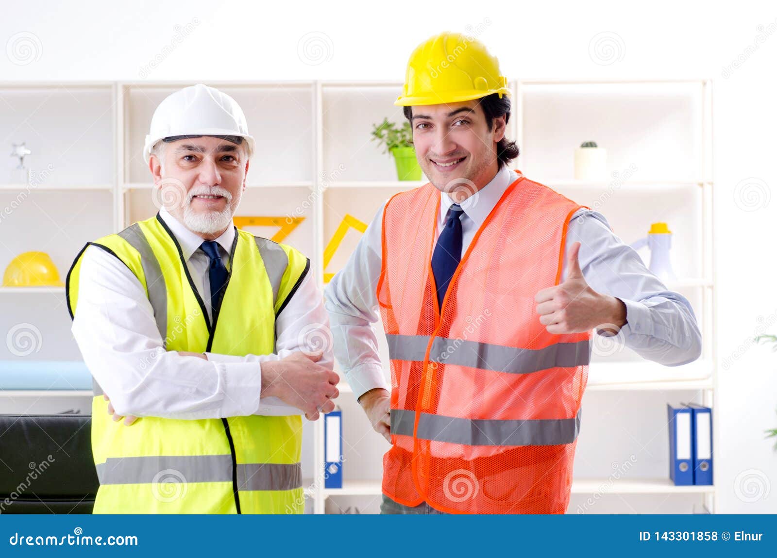 The Two Engineers Colleagues Working Under Project Stock Photo - Image ...