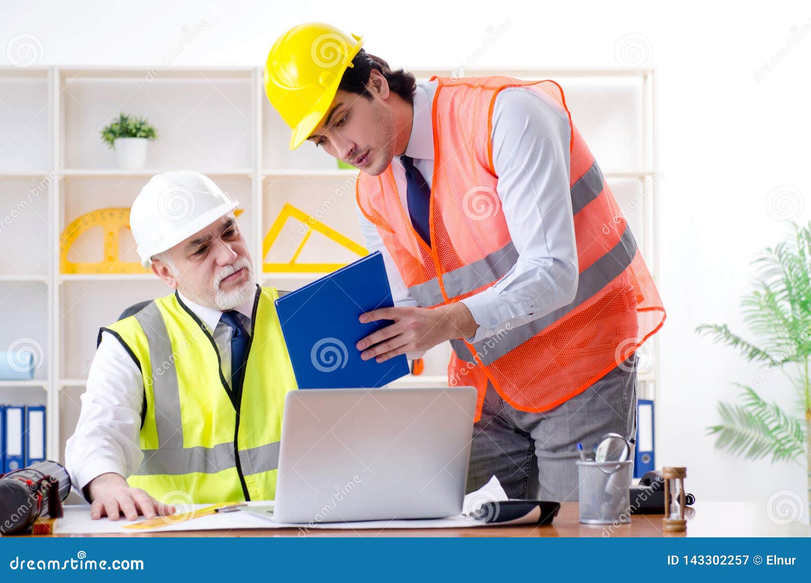 The Two Engineers Colleagues Working Under Project Stock Image - Image ...