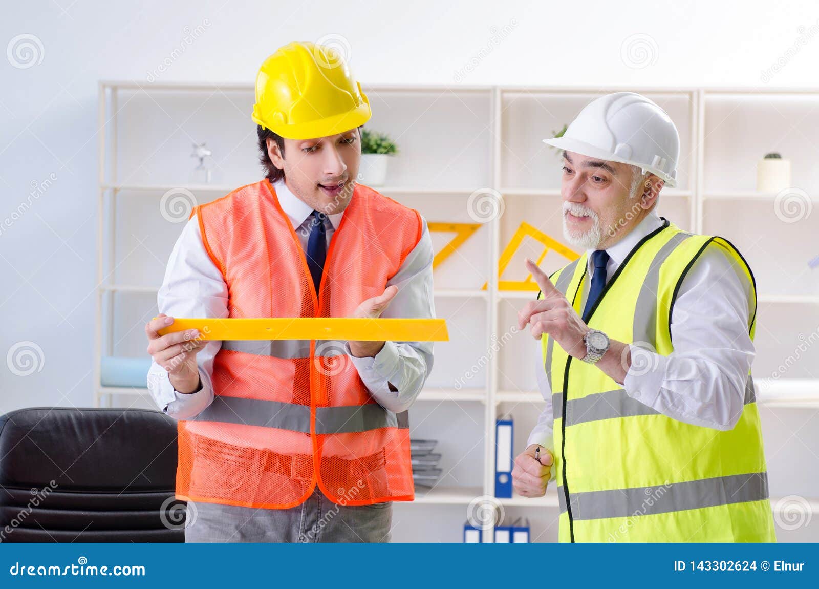 The Two Engineers Colleagues Working Under Project Stock Photo - Image ...