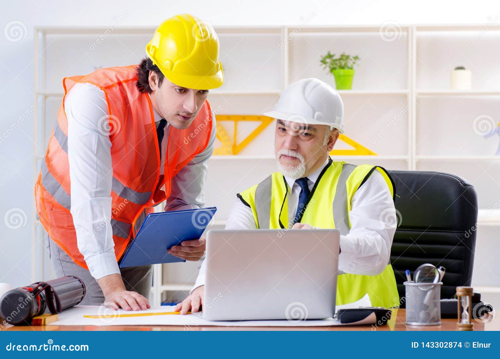 The Two Engineers Colleagues Working Under Project Stock Photo - Image ...