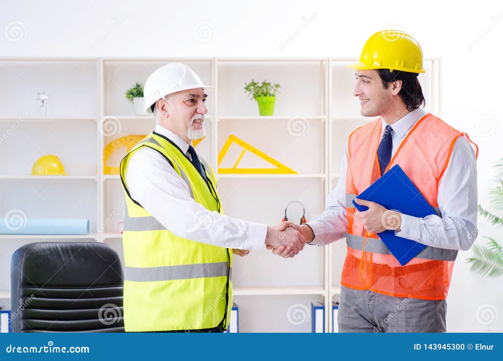 The Two Engineers Colleagues Working Under Project Stock Photo - Image ... The Two Engineers Colleagues Working Under Project Stock Photo - Image ...