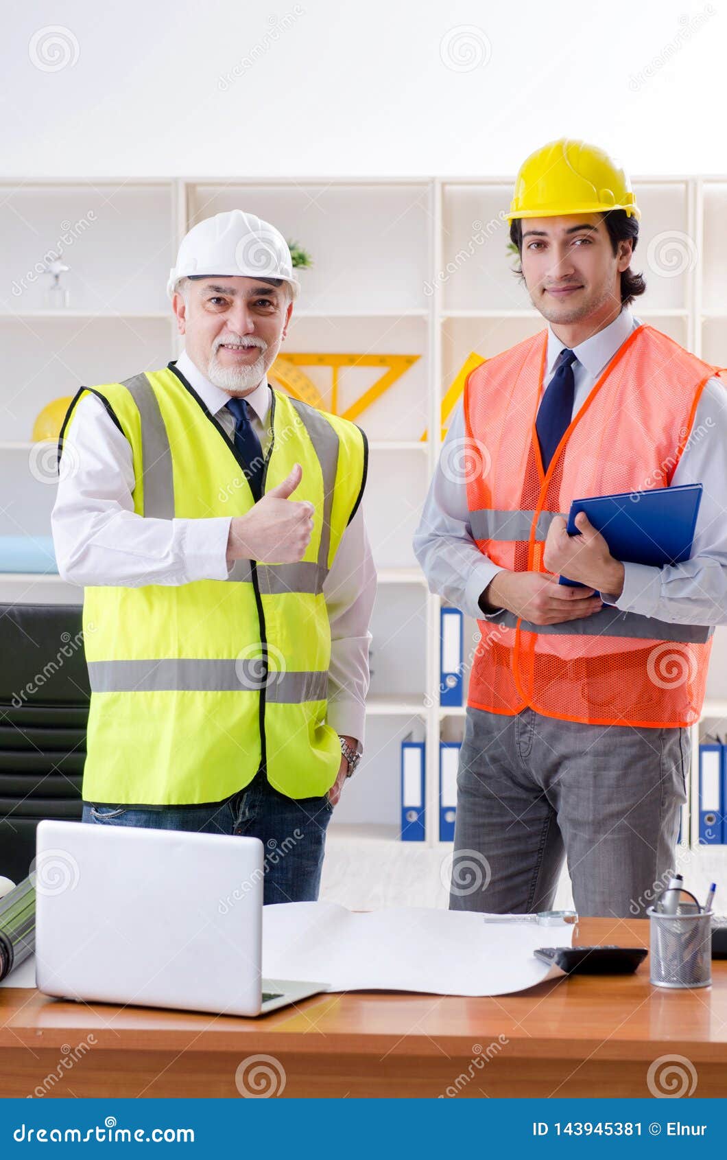 The Two Engineers Colleagues Working Under Project Stock Image - Image ...