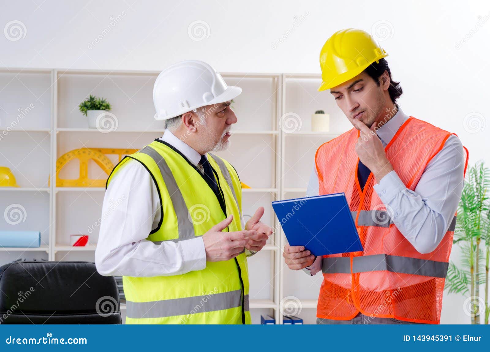 The Two Engineers Colleagues Working Under Project Stock Image - Image ...
