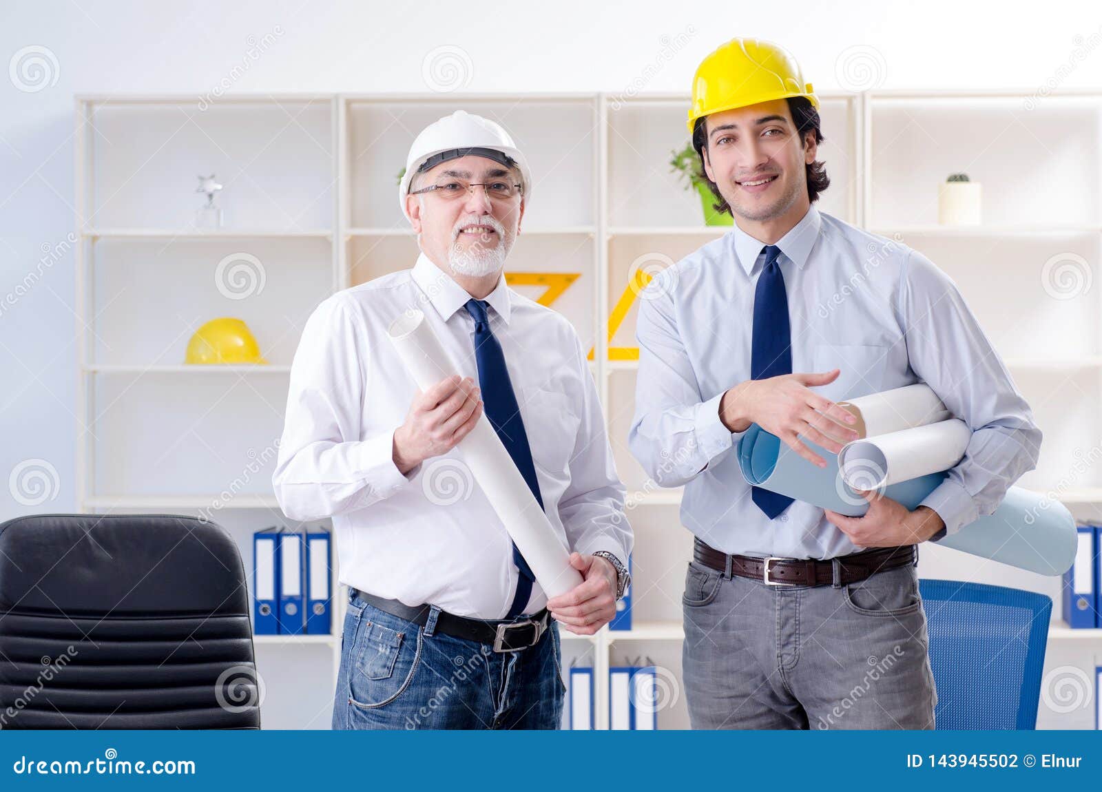 The Two Engineers Colleagues Working Under Project Stock Photo - Image ...