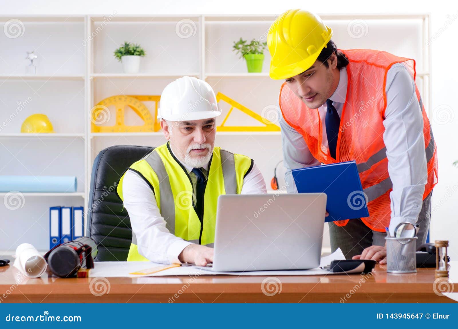 The Two Engineers Colleagues Working Under Project Stock Image - Image ...