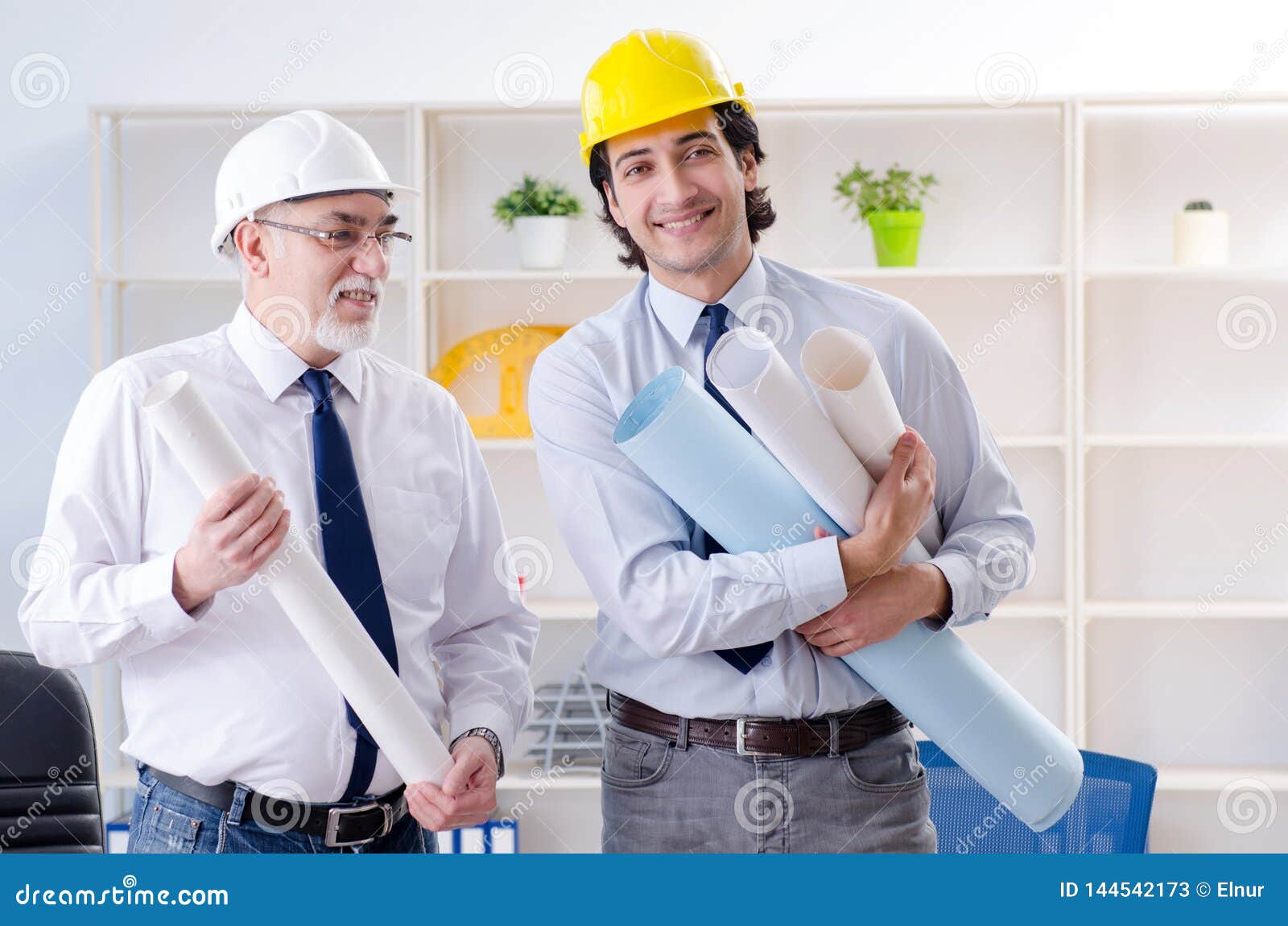 The Two Engineers Colleagues Working Under Project Stock Image - Image ...