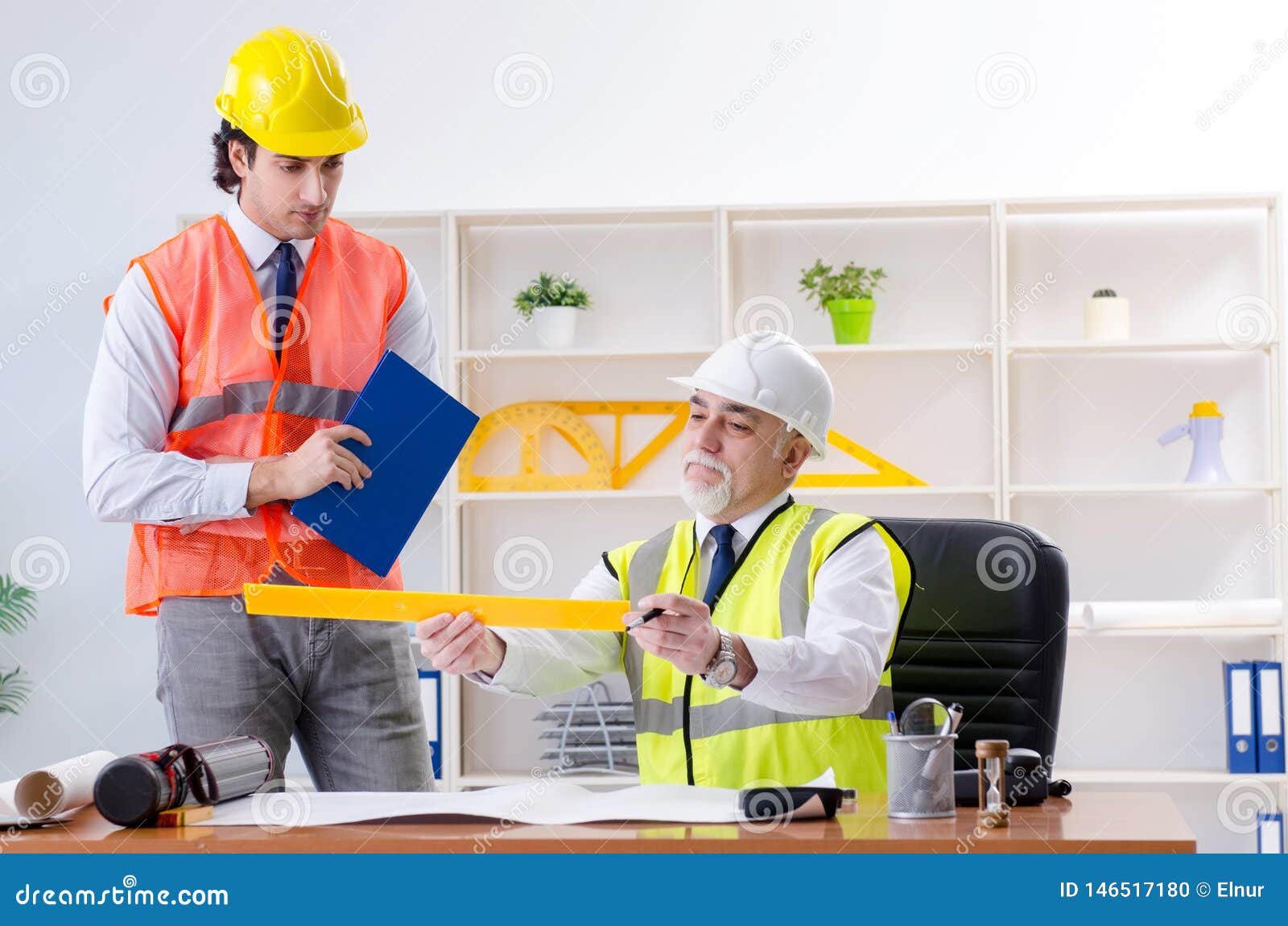 The Two Engineers Colleagues Working Under Project Stock Photo - Image ...